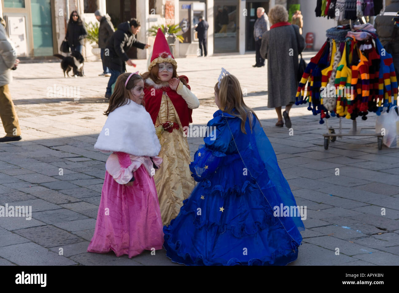 Three young girls in hats and costumes at the carnival, in Campo Santa ...