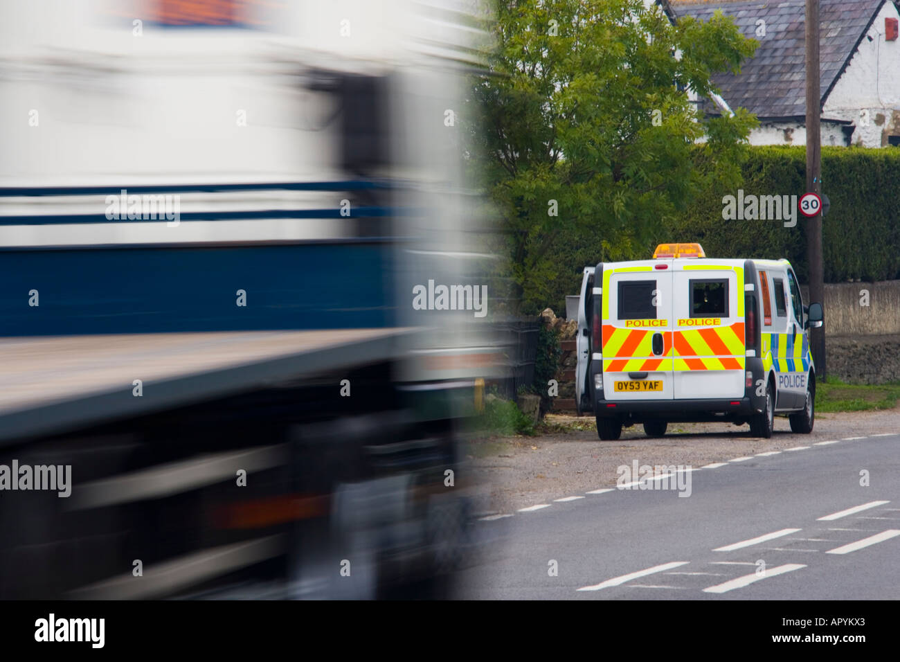 Truck speeding past 30 mph police mobile speed trap traffic safety ...