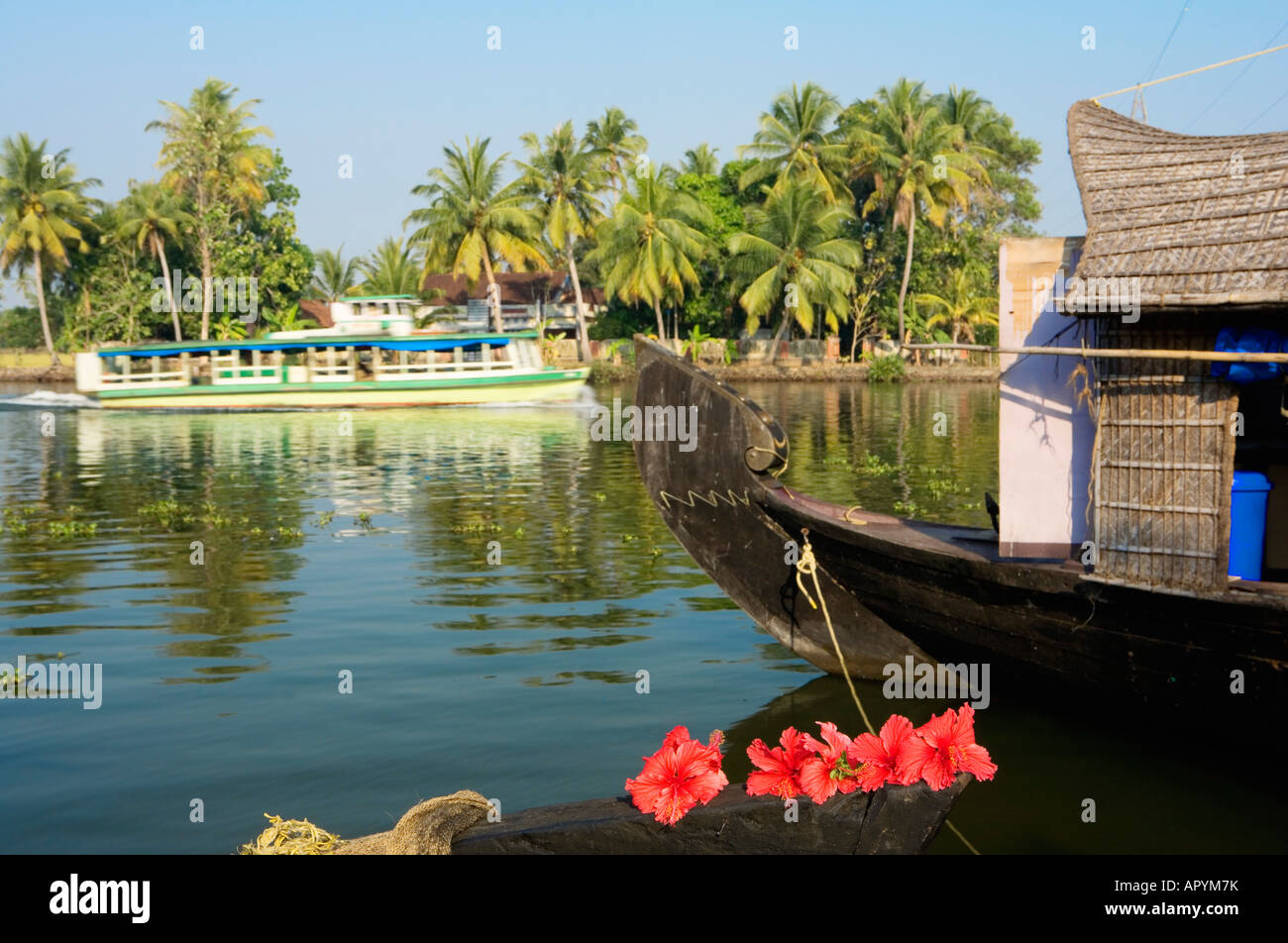 INDIA KERALA BACKWATERS RICE BOAT AND LOCAL FERRY Stock Photo - Alamy