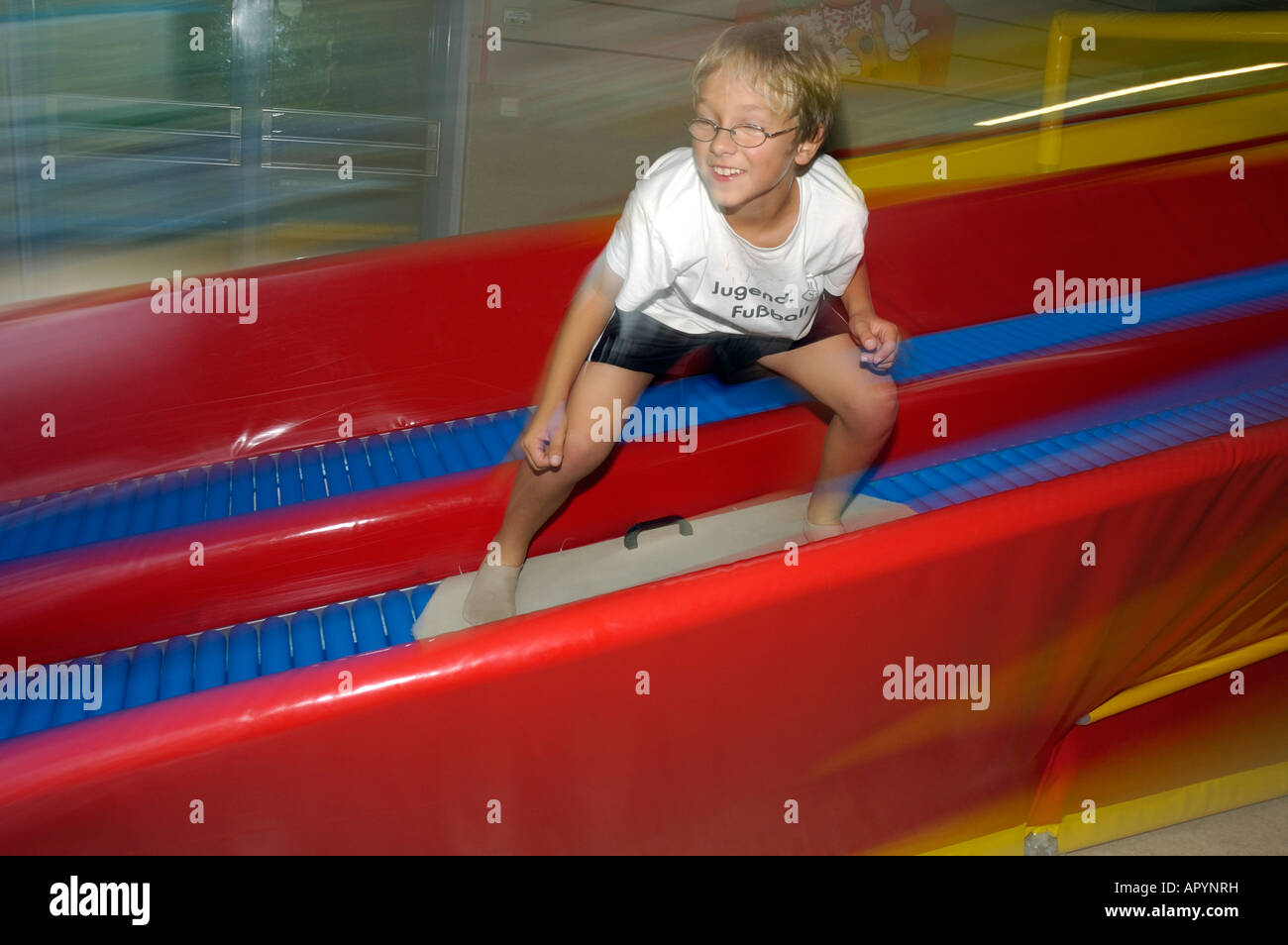 Fast moving boy Stock Photo - Alamy