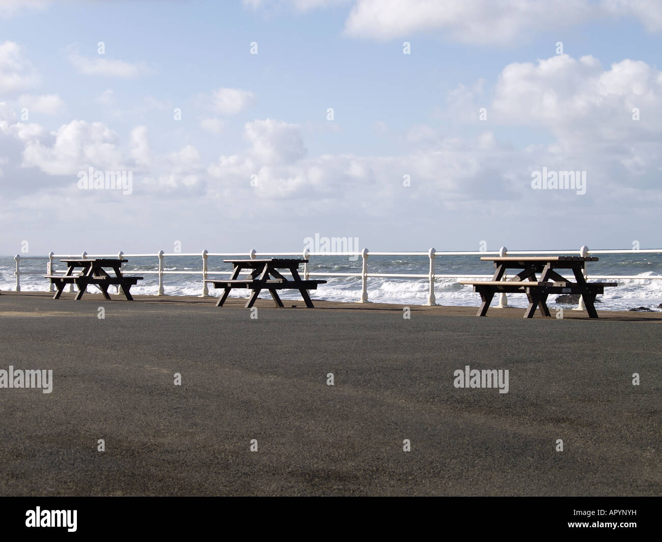 Picnic tables on the promenade beside the sea, Crooklets beach, Bude ...
