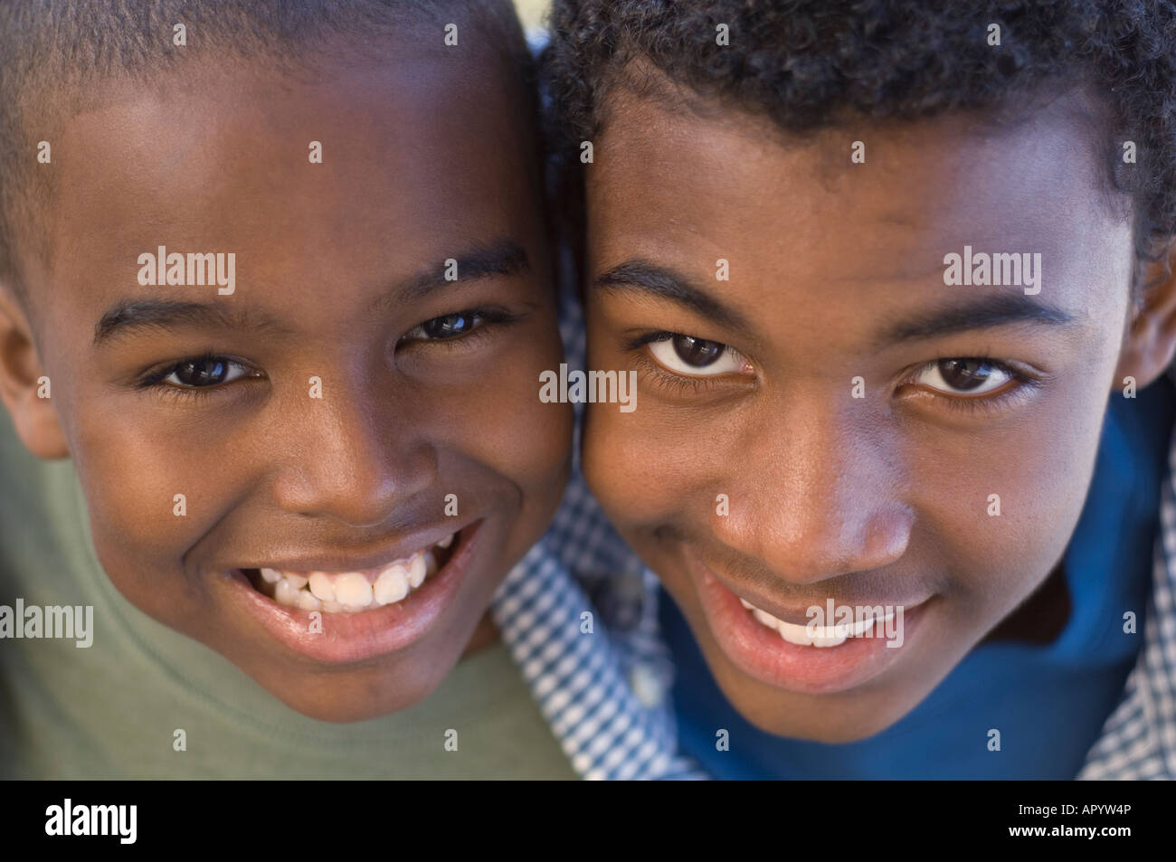 Close up of African brothers smiling Stock Photo - Alamy