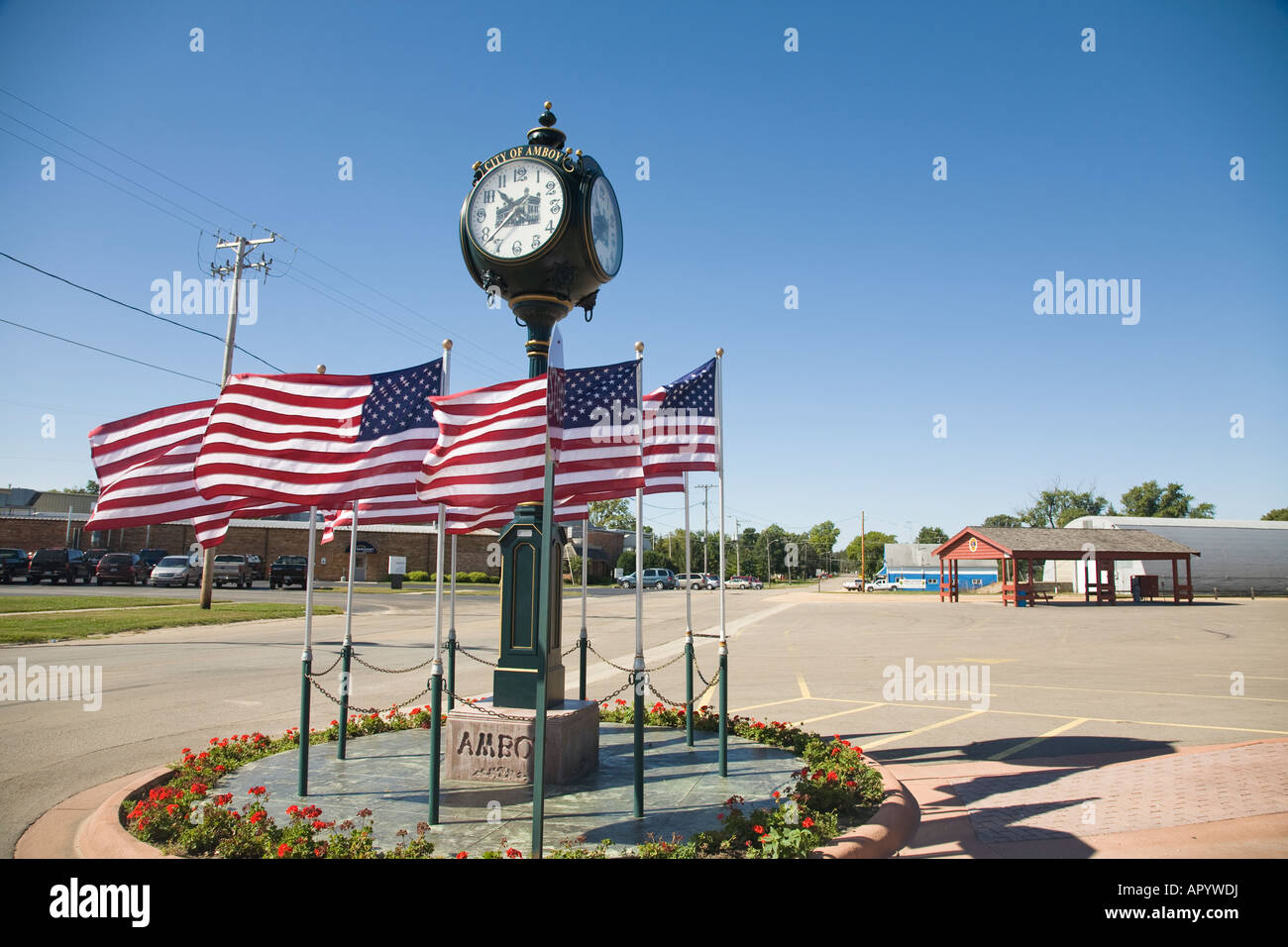 ILLINOIS Amboy American flags around large clock small town railroad ...