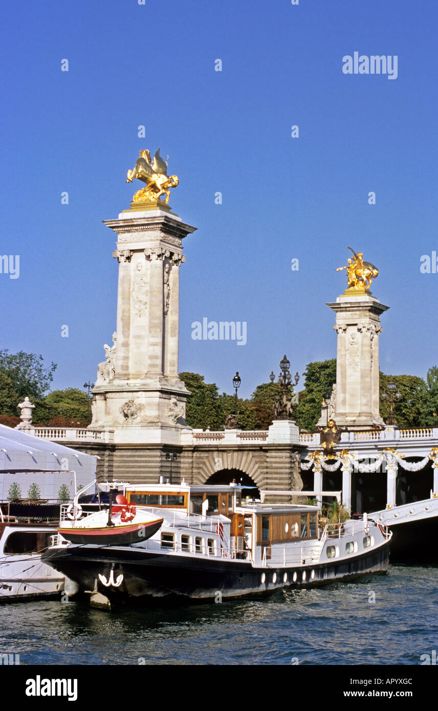 Paris Pont de Alexandre III and barges Seine river Stock Photo - Alamy