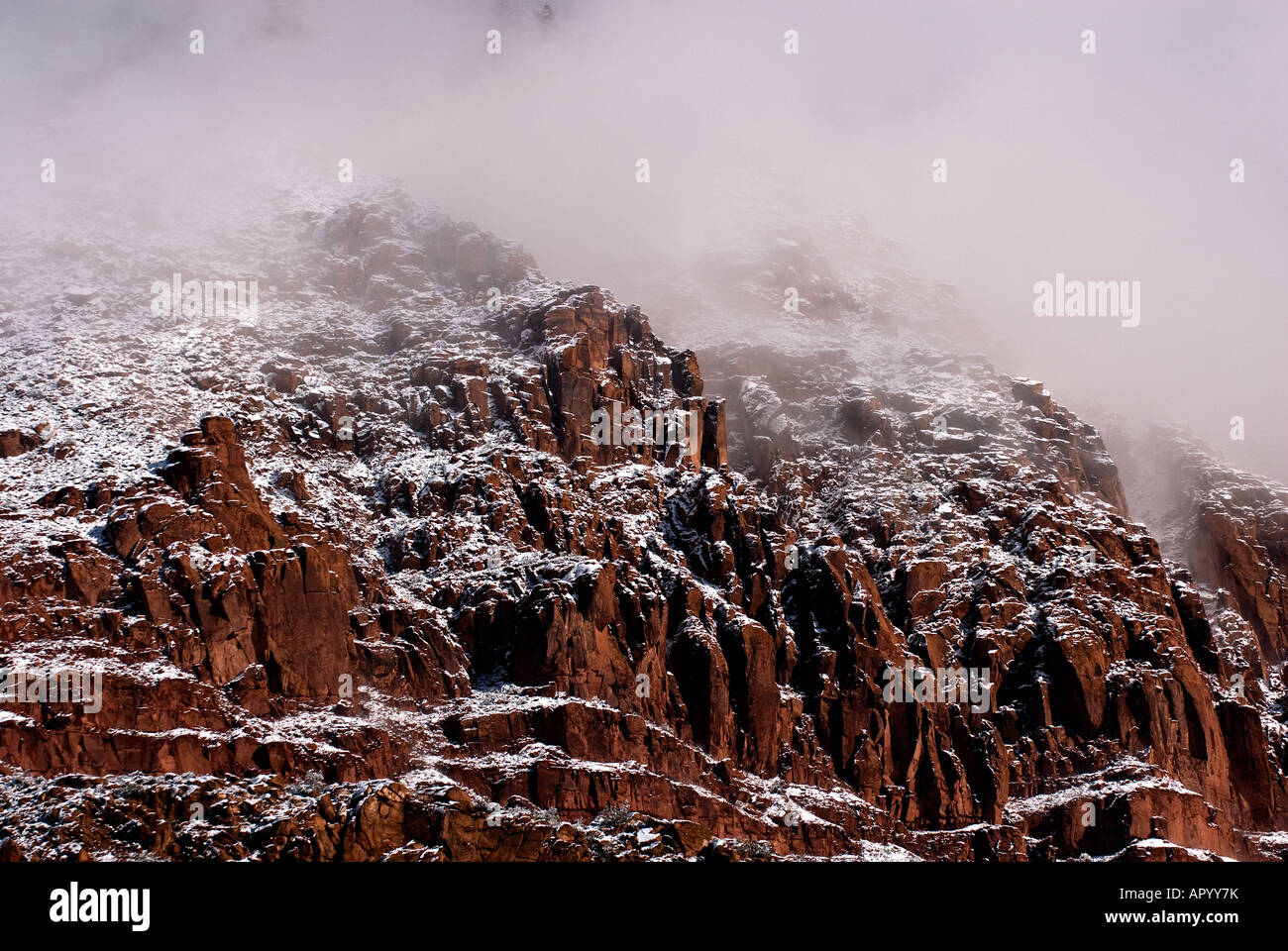 Snow and mist cover Red Mountain, Ivins, Utah. Stock Photography by ...