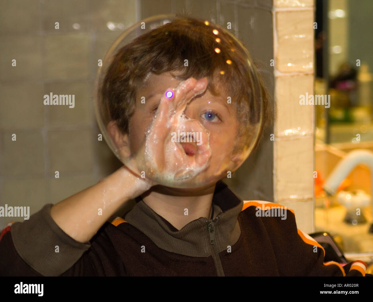 Child blowing soap bubbles Stock Photo - Alamy Child blowing soap bubbles Stock Photo - Alamy