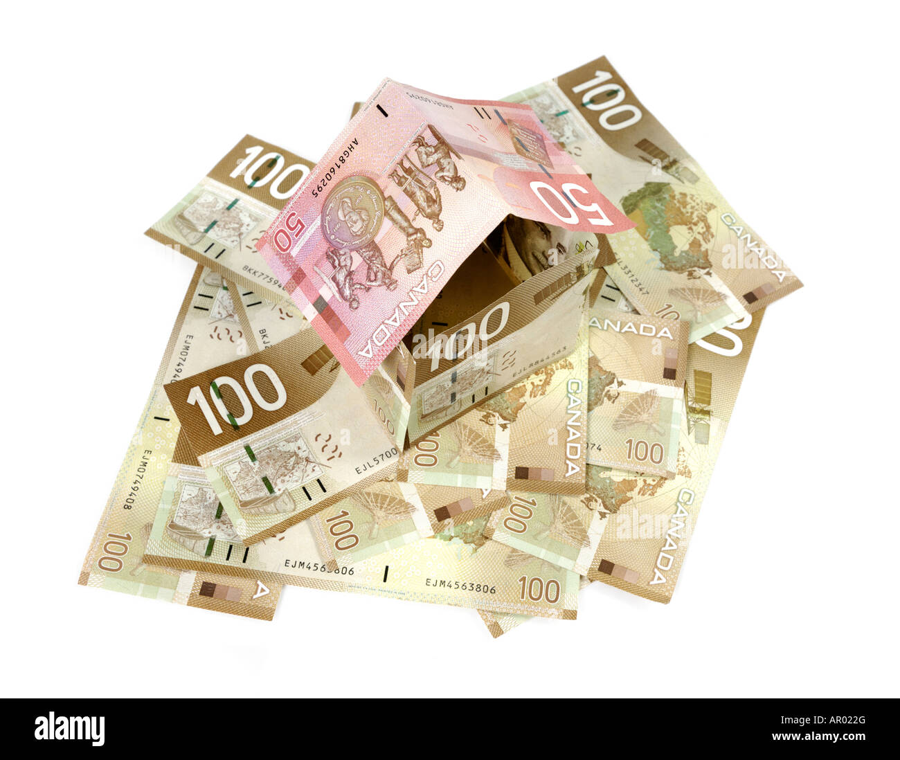 Family house made from Canadian dollar bills Stock Photo - Alamy