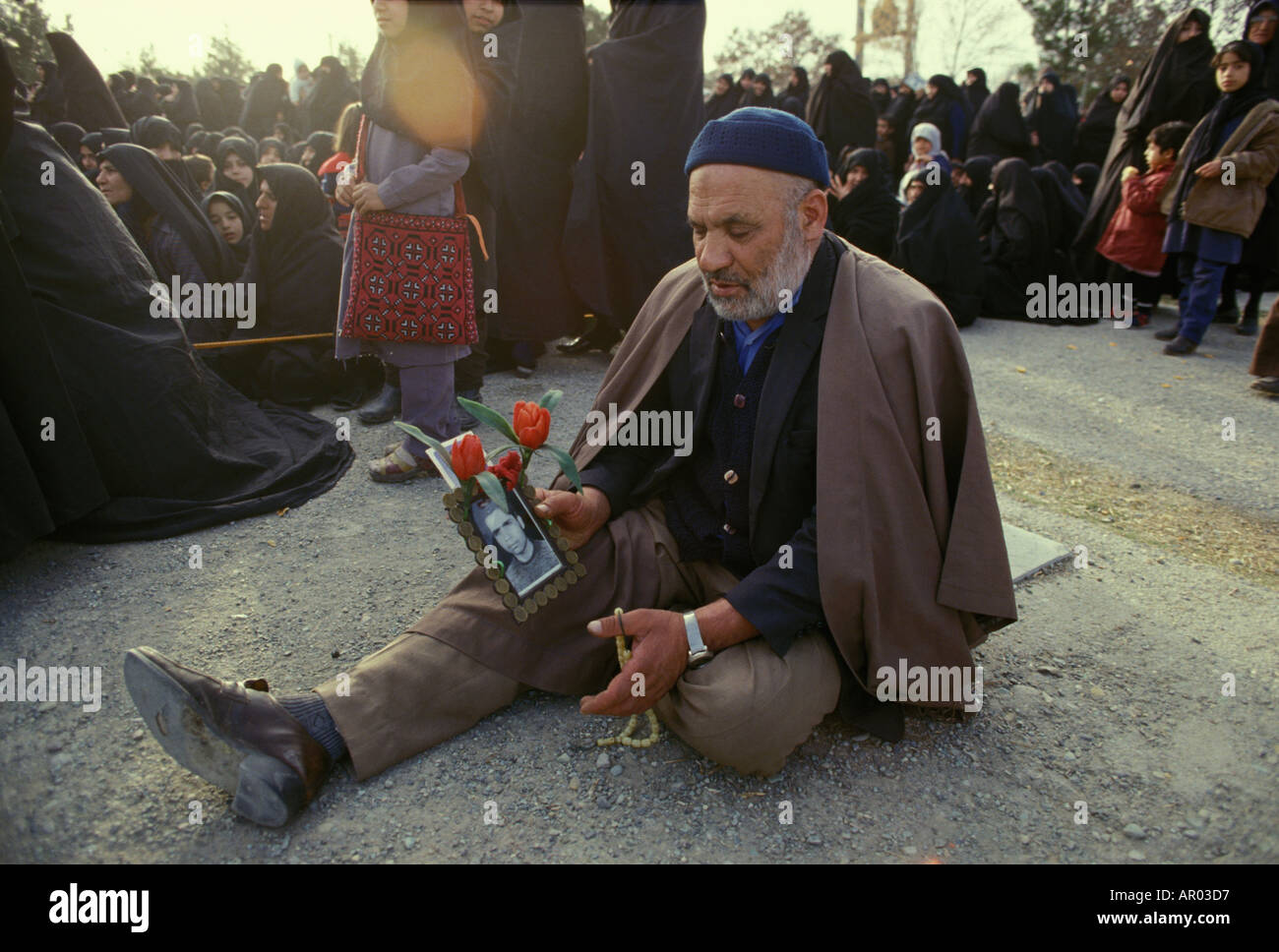 Iranian father mourns the death of his son during the Iraq Iran war ...
