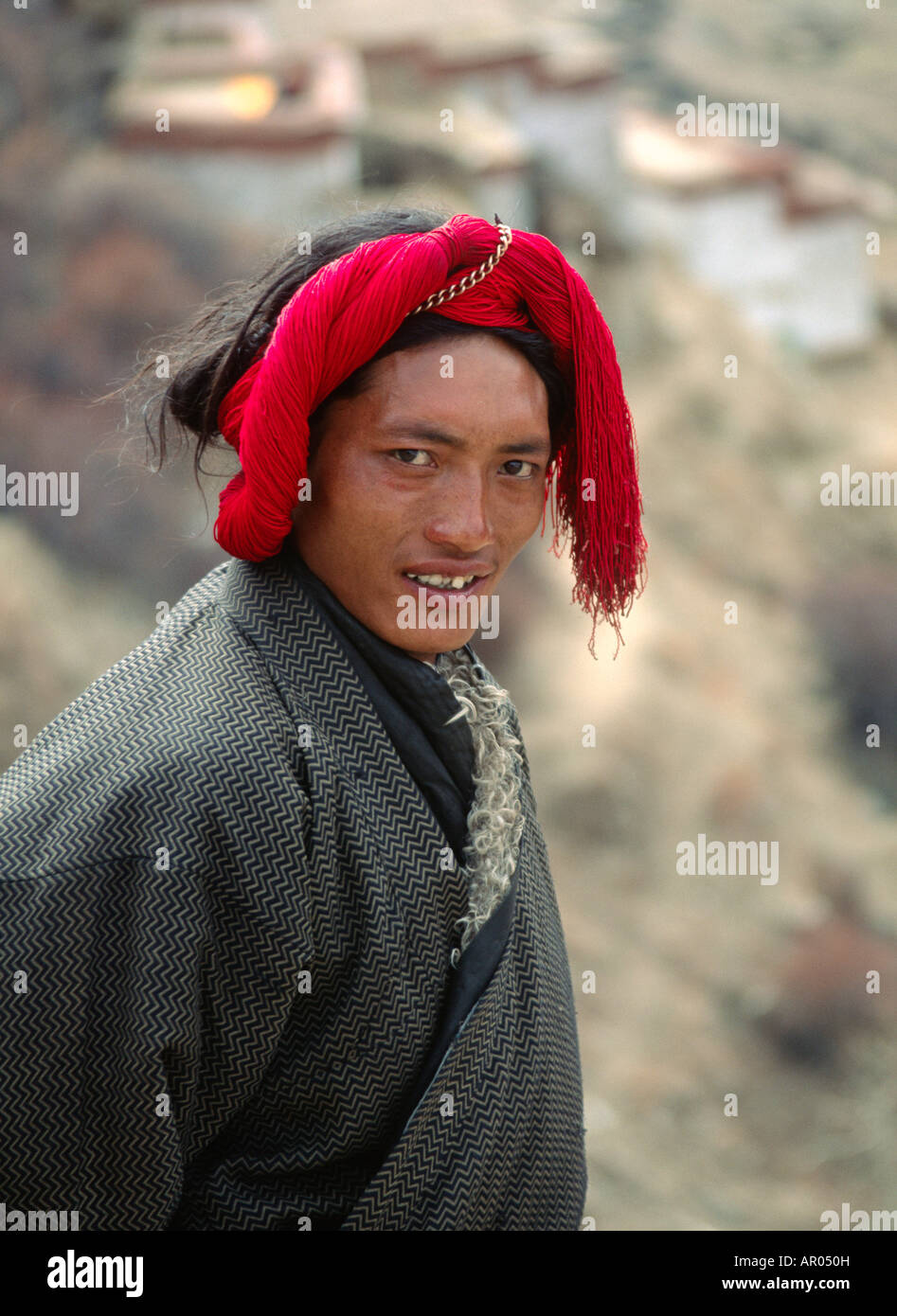 A PILGRIM from KHAM visits the DRIGUNG MONASTERY in CENTRAL TIBET Stock ...