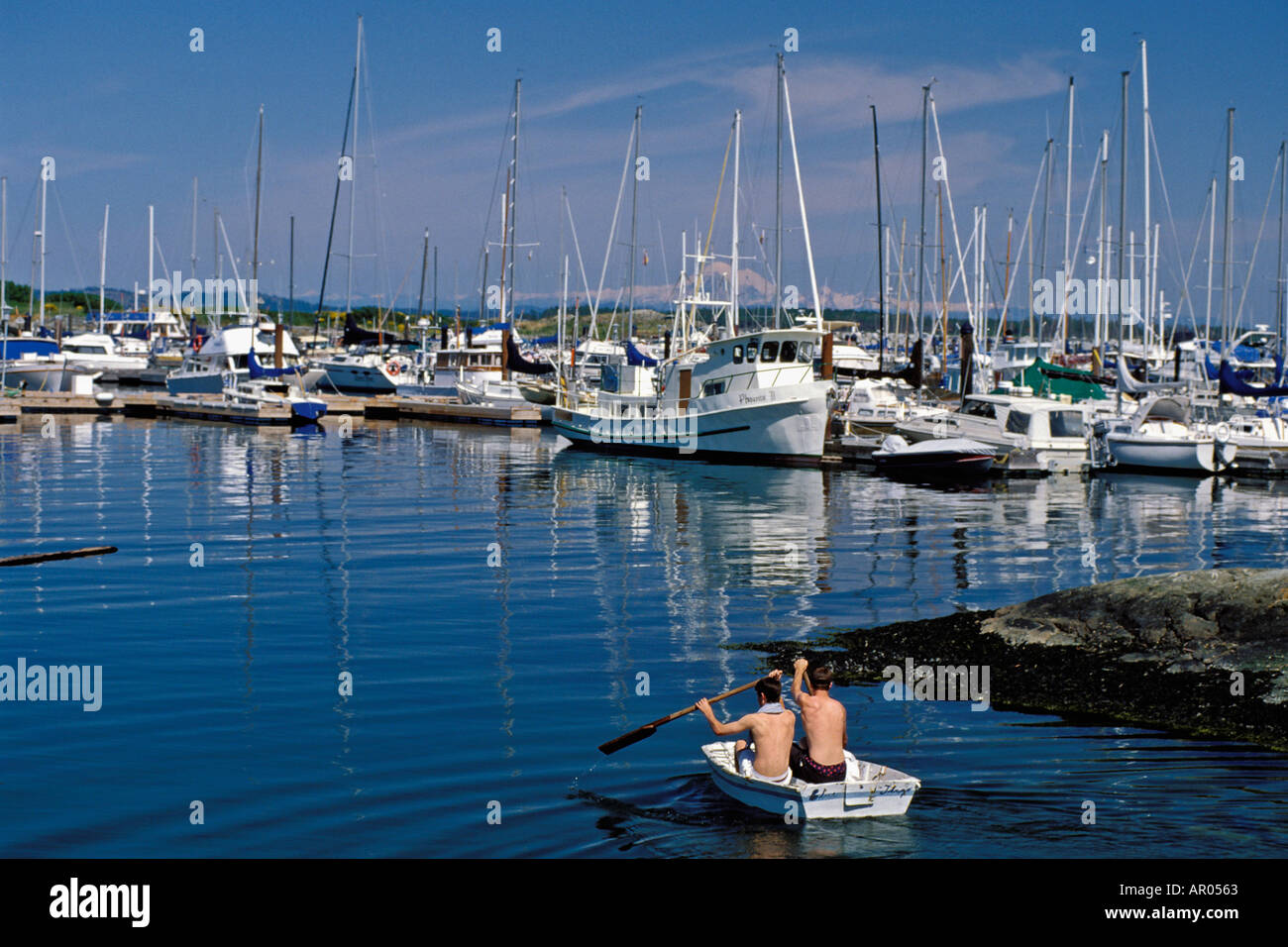 Boys In Rowboat Near Haynes Park In Victoria BC Canada Sailboat Marina ...