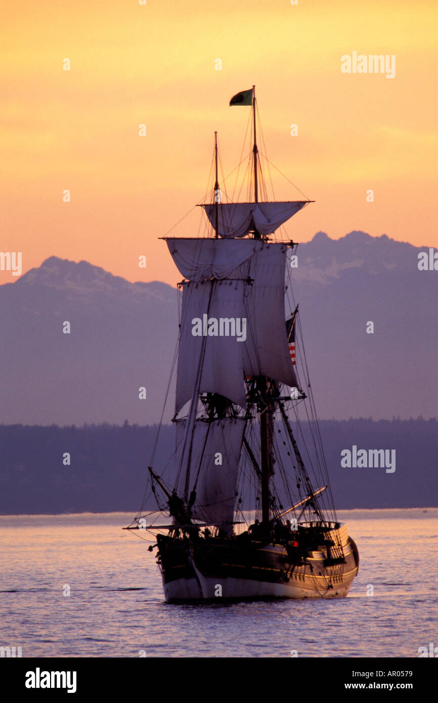 The brig Lady Washington Sails The Sunset Waters Of Puget Sound ...