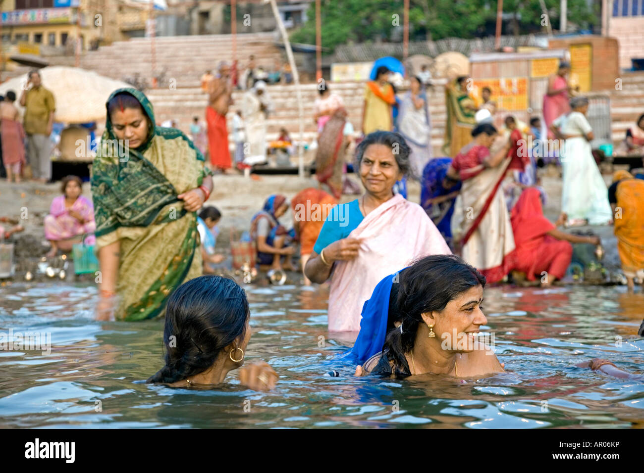 Morning ritual bath assi ghat hi-res stock photography and images - Alamy