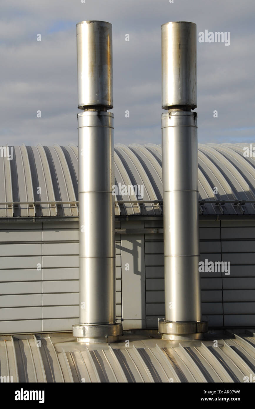 Roof with metal-chimneys Stock Photo - Alamy
