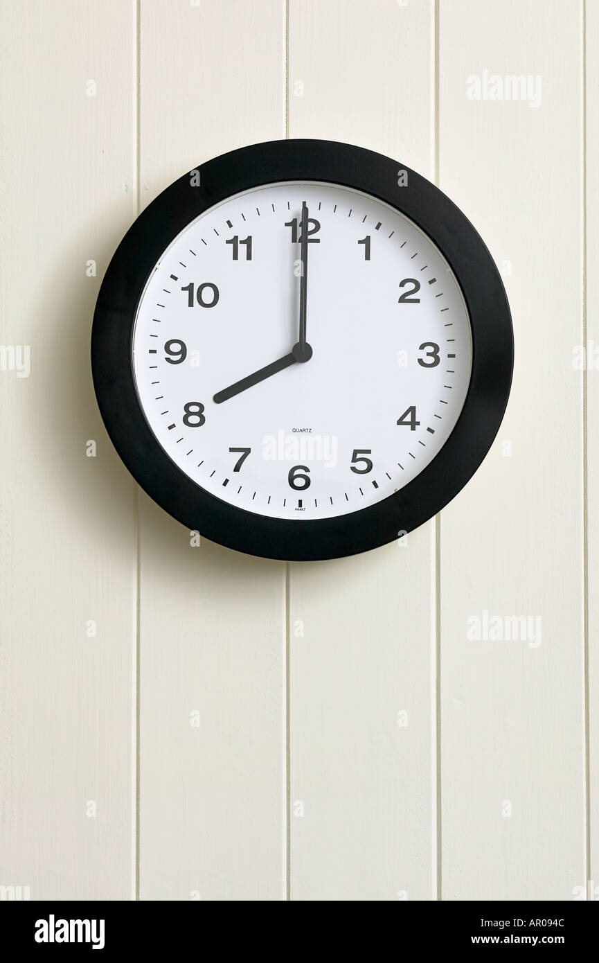 wall clock showing time at eight o clock 0800 2000 Stock Photo - Alamy