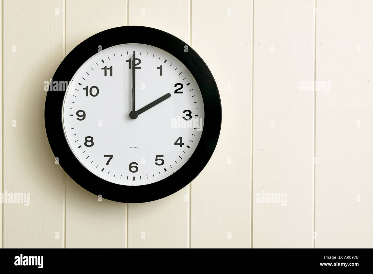 wall clock showing time at two o clock 0200 1400 Stock Photo - Alamy