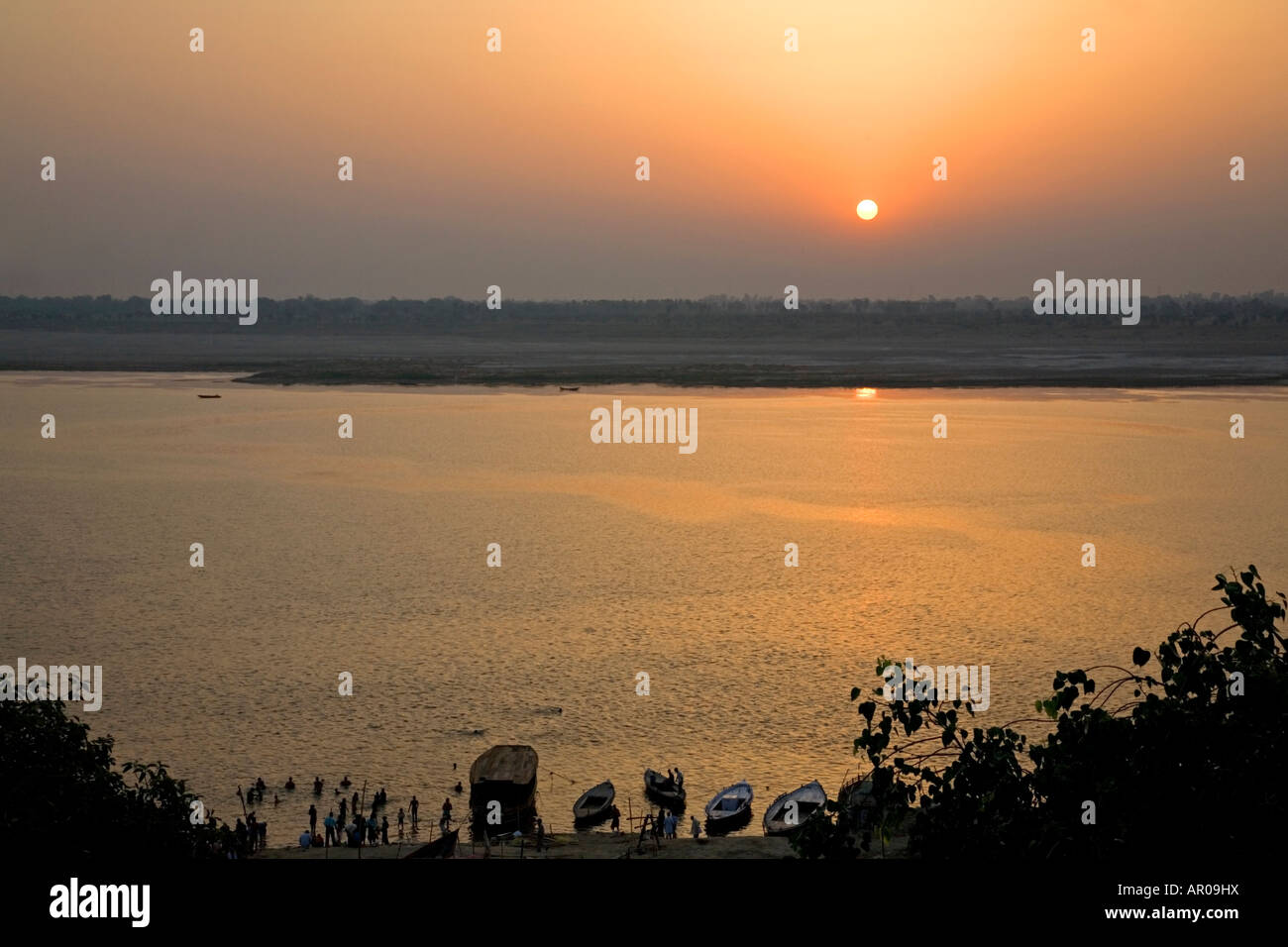 Sunrise at Assi Ghat. Ganges river. Varanasi. India Stock Photo - Alamy