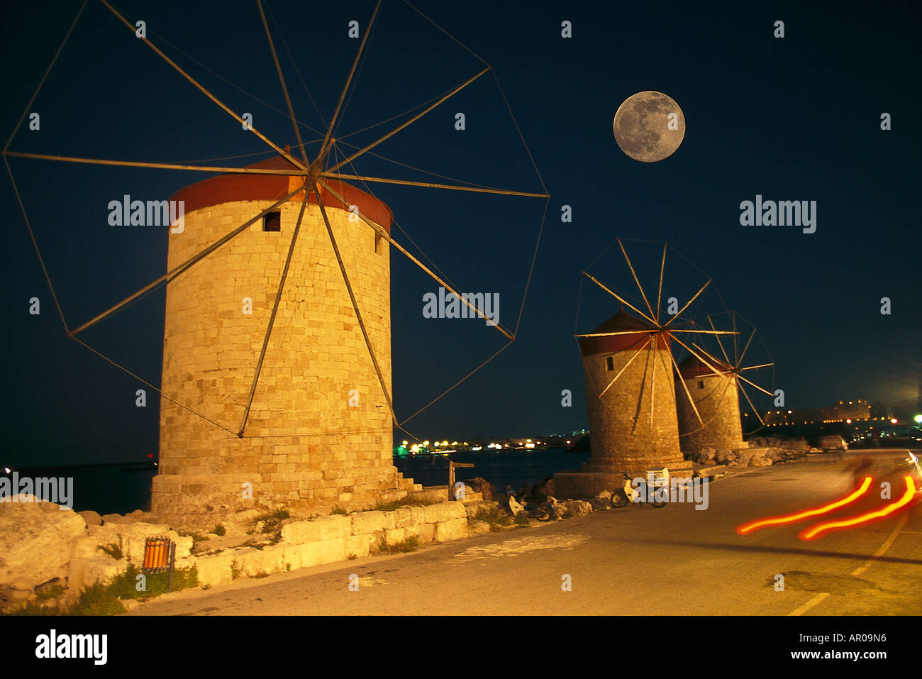 Rhodes windmills in the harbour at night, Rhodos City, Mandraki, Aegean ...