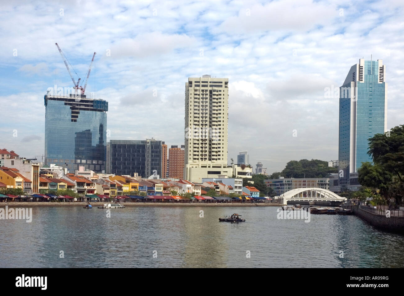 Riverside shops and office towers in the old town Boat Quay area of ...