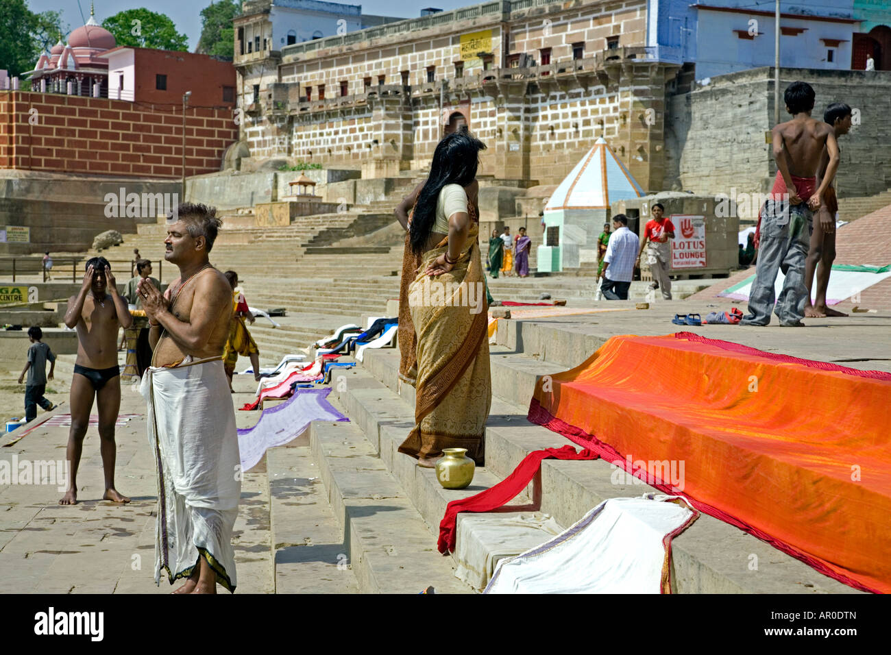 Man praying. Hanuman Ghat. Ganges river. Varanasi. India Stock Photo ...