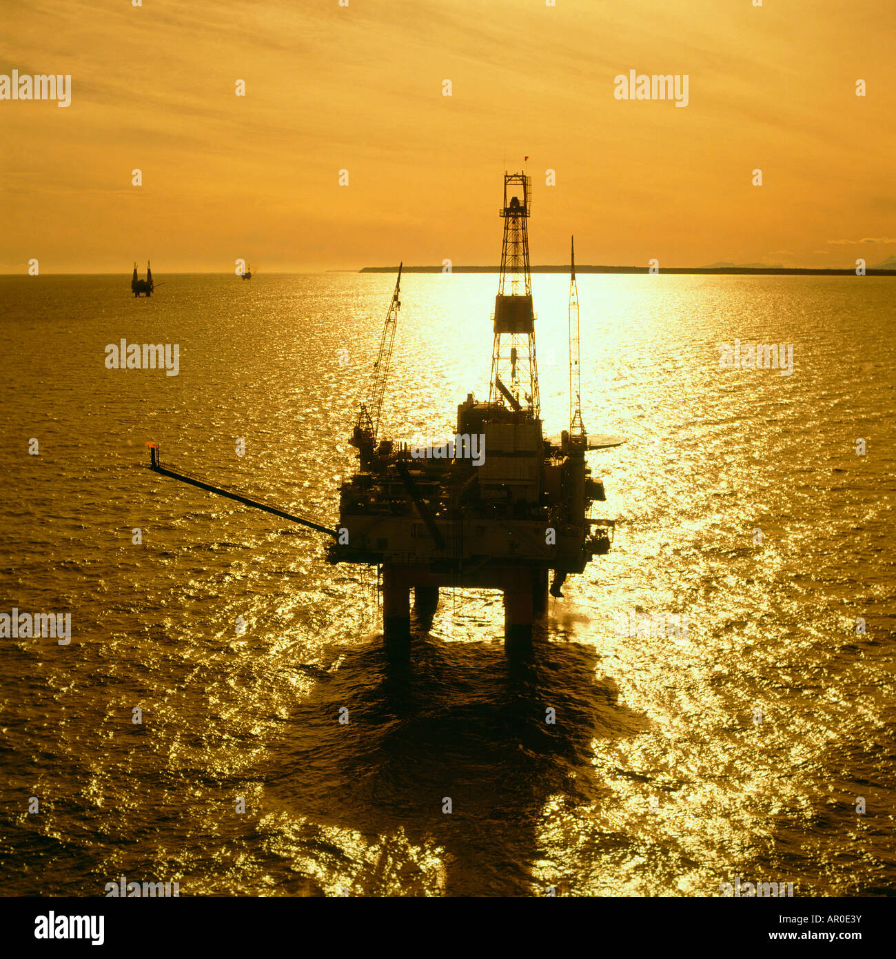 Oil rig in Cook Inlet Anchorage SC AK sunset summer scenic Stock Photo ...