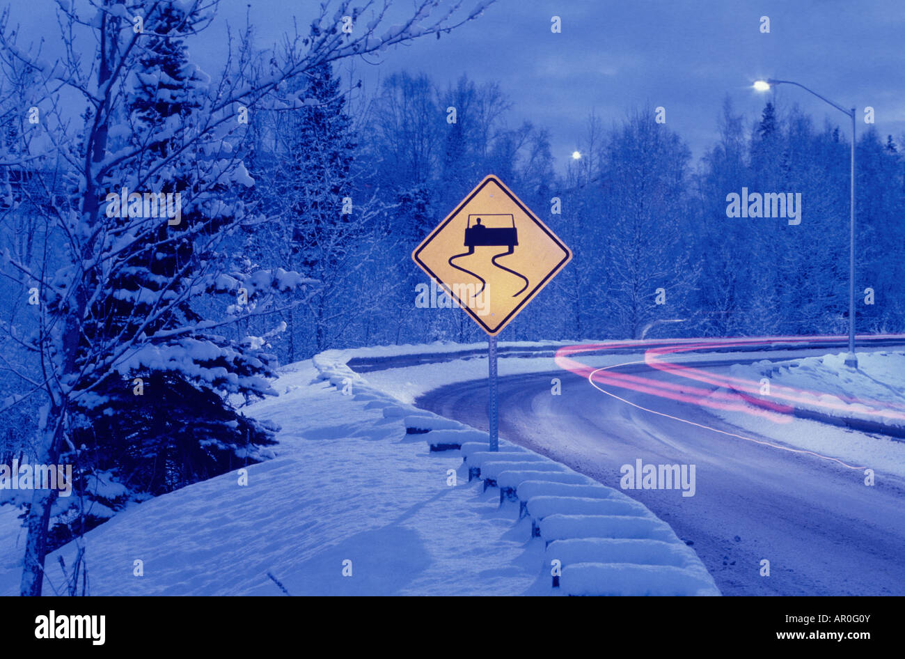 Windy Road Sign & Traffic on Hwy in Southcentral AK winter scenic Stock ...