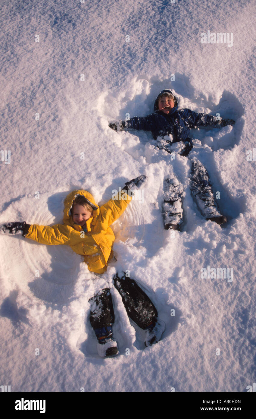 Kids make snow angels Russian Jack Park Anchorage SC AK winter aerial ...