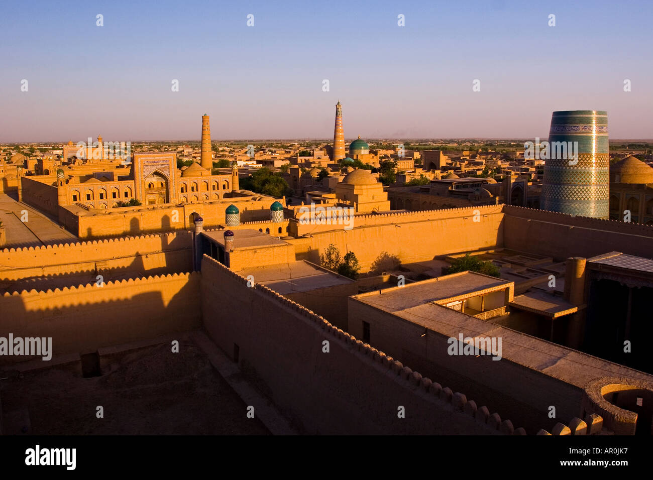 Panorama of the mud brick city of Khiva at sunset Khiva Uzbekistan ...