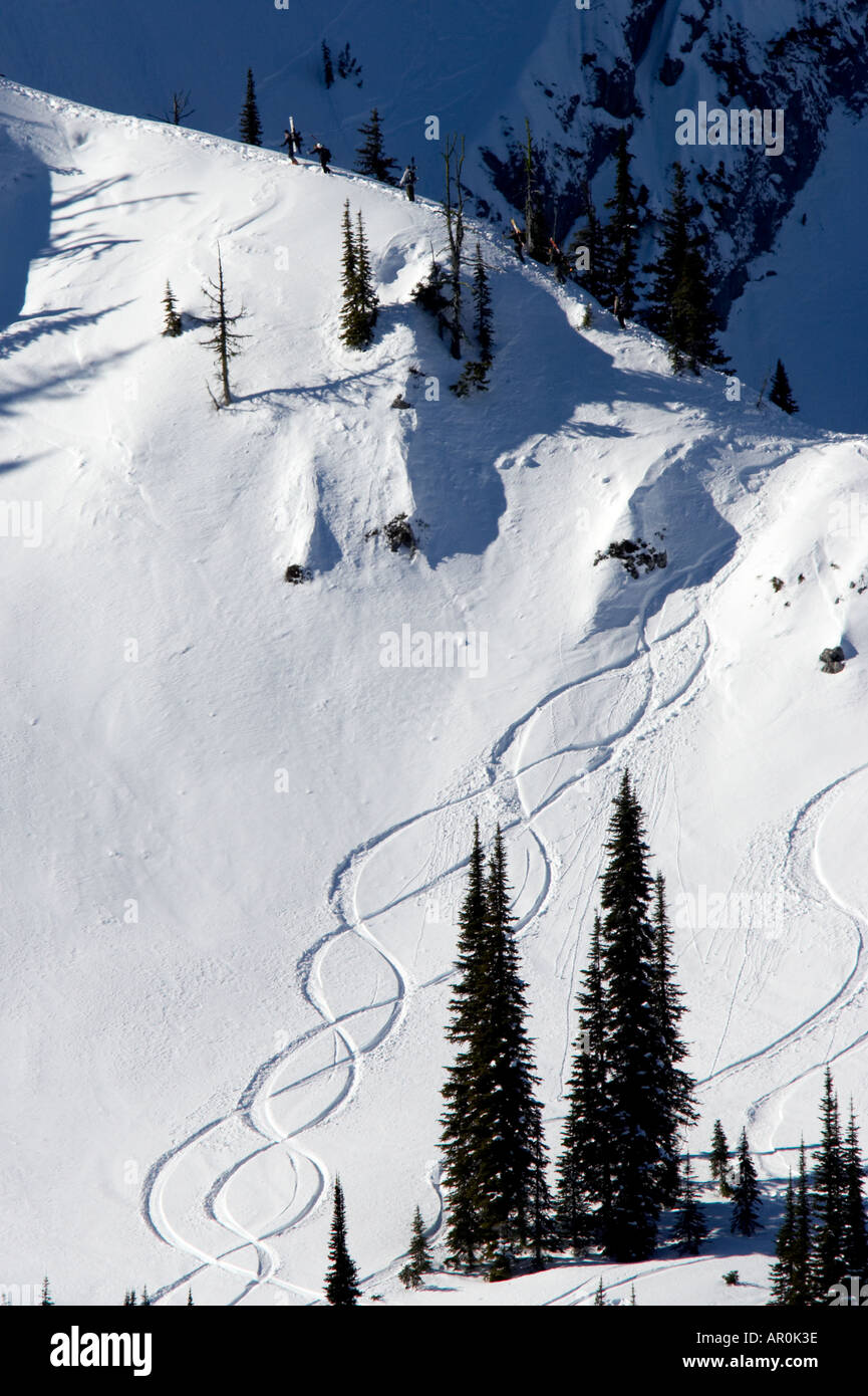 Ski trails in snow on mountain Stock Photo - Alamy