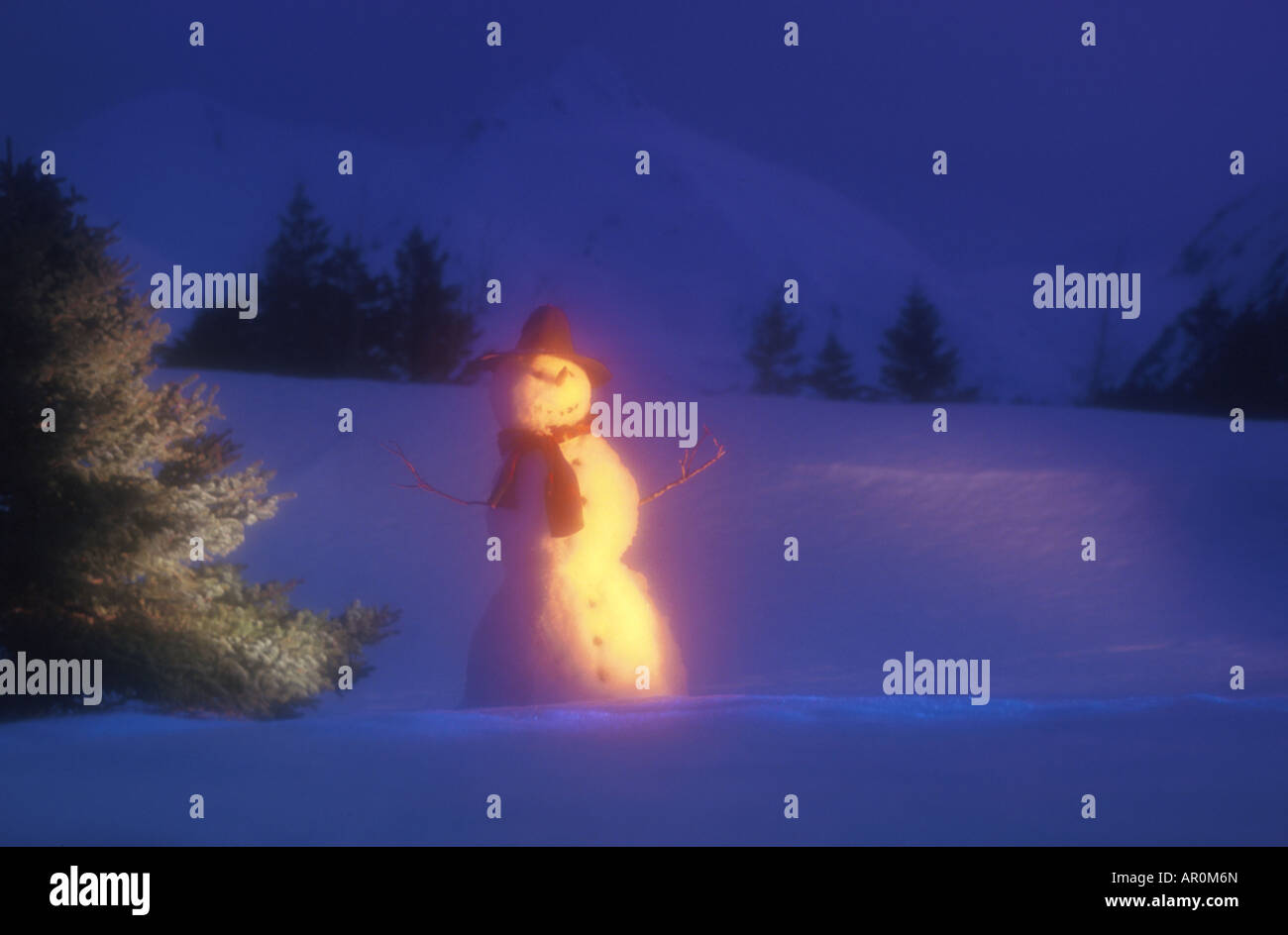 Snowman glowing light portage valley hi-res stock photography and ...
