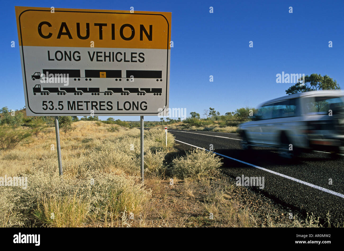 Sign warning that long vehicles of over 50 metres are on the road ...