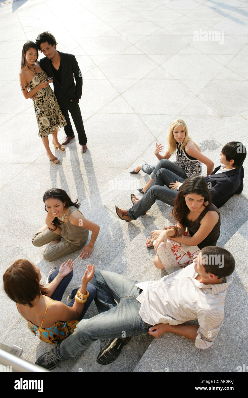 Above view of a group of people sitting on steps Stock Photo - Alamy
