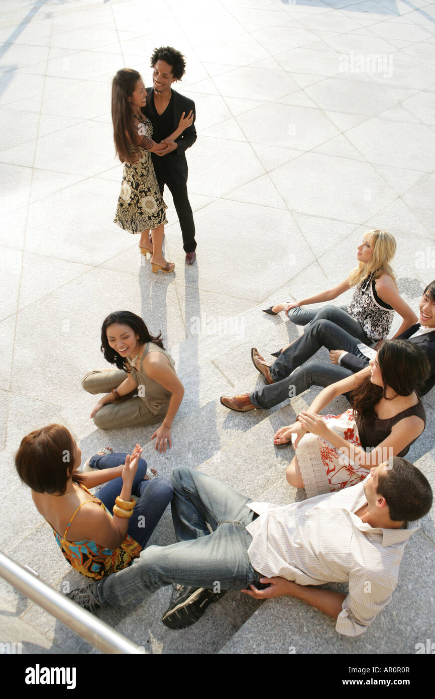 Aerial view of young people sitting on steps Stock Photo - Alamy
