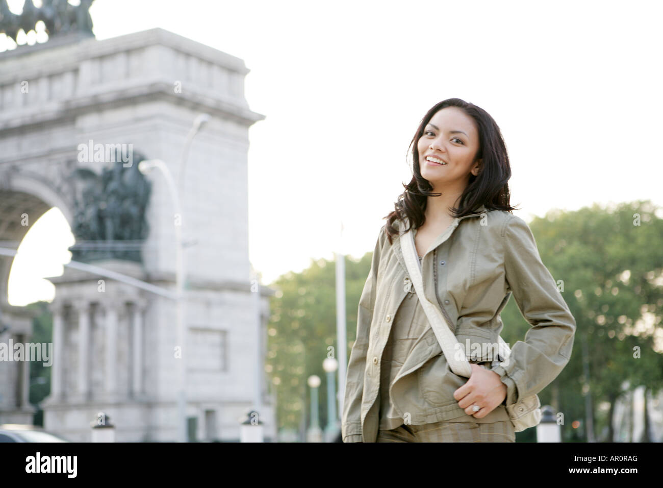 Woman standing outside Stock Photo - Alamy