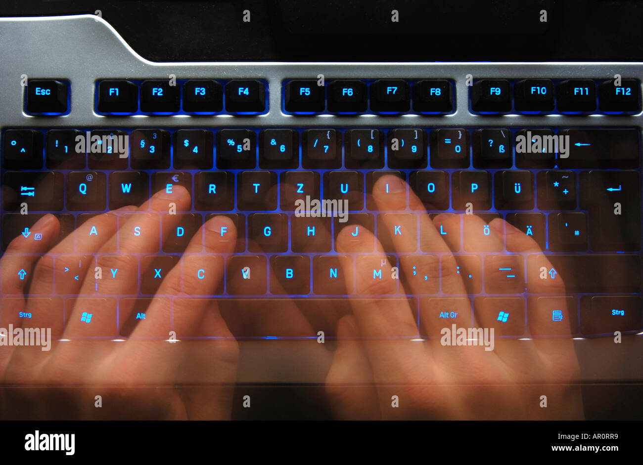 Hands writing on a Keyboard Stock Photo - Alamy