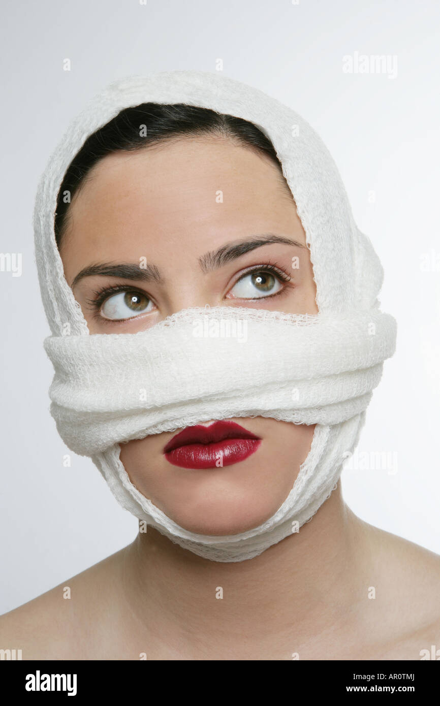Woman wearing bandage on her face and head Stock Photo - Alamy