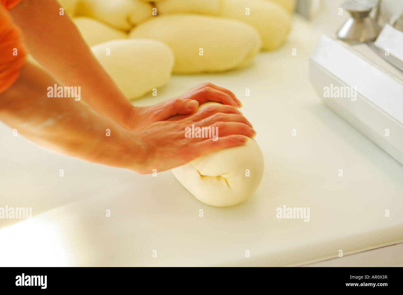 Kneading dough for fresh pasta in Italy Stock Photo - Alamy