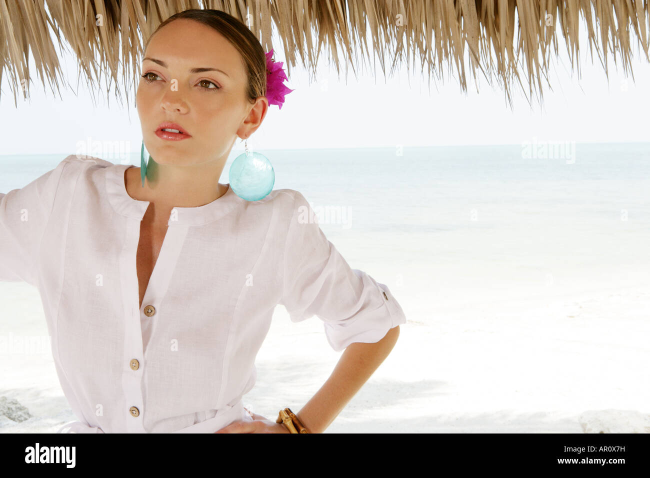 Young woman in beach hut Stock Photo - Alamy