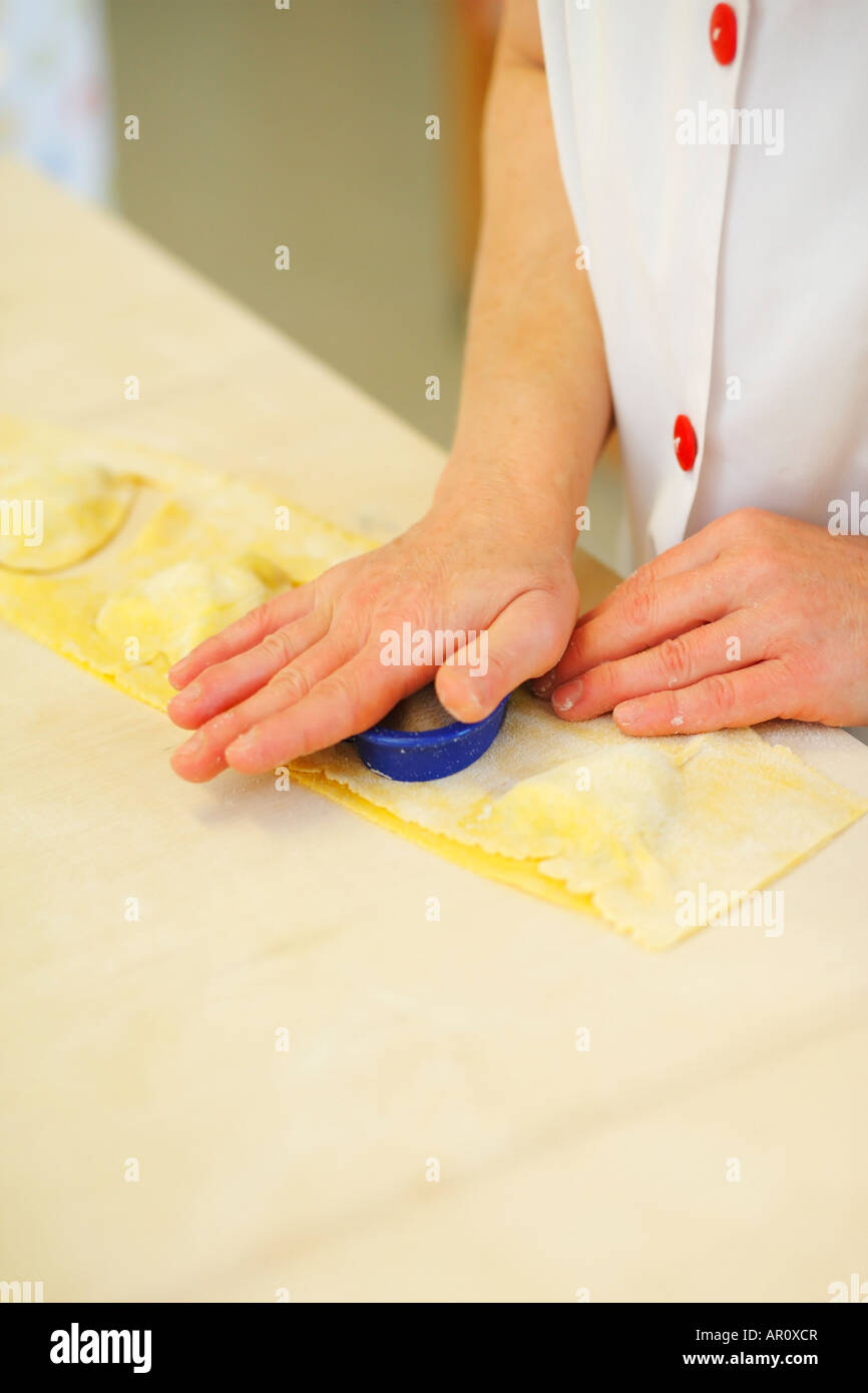 Preparation of hart-shaped ravioli, Italy Stock Photo - Alamy