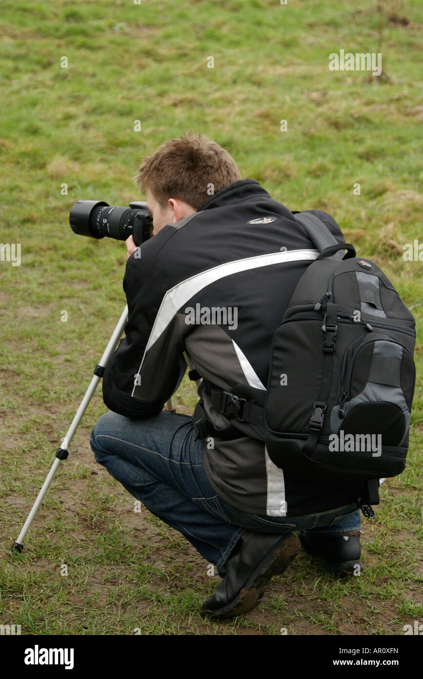 Photographer and Tripod Stock Photo - Alamy