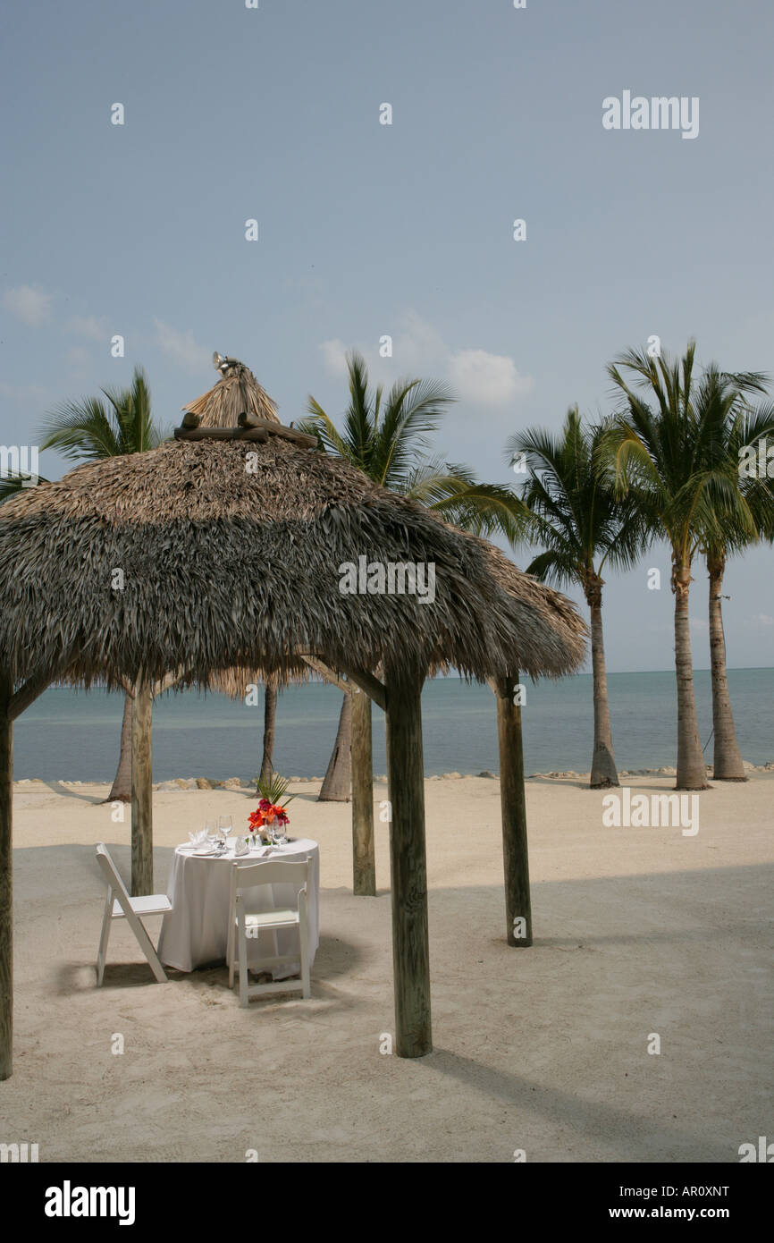 Dinner table in beach hut Stock Photo - Alamy