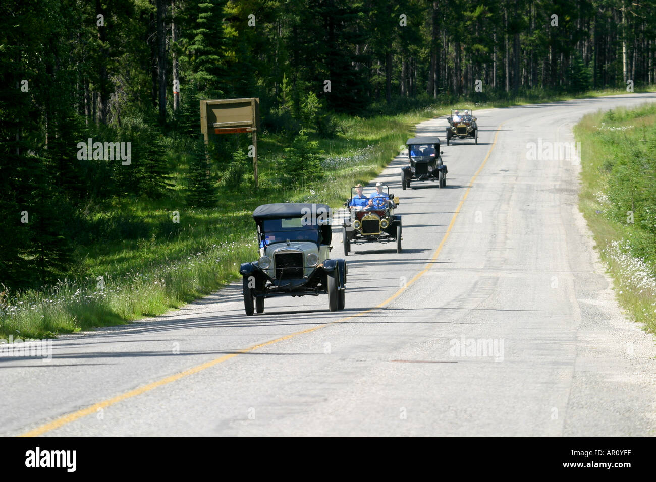 Antique cars driving historical hi-res stock photography and images - Alamy