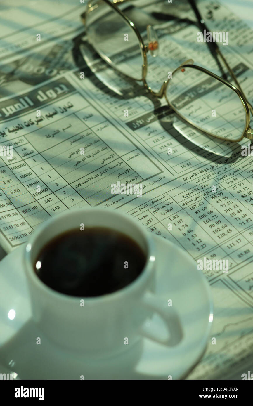 A cup of tea with newspaper Stock Photo - Alamy