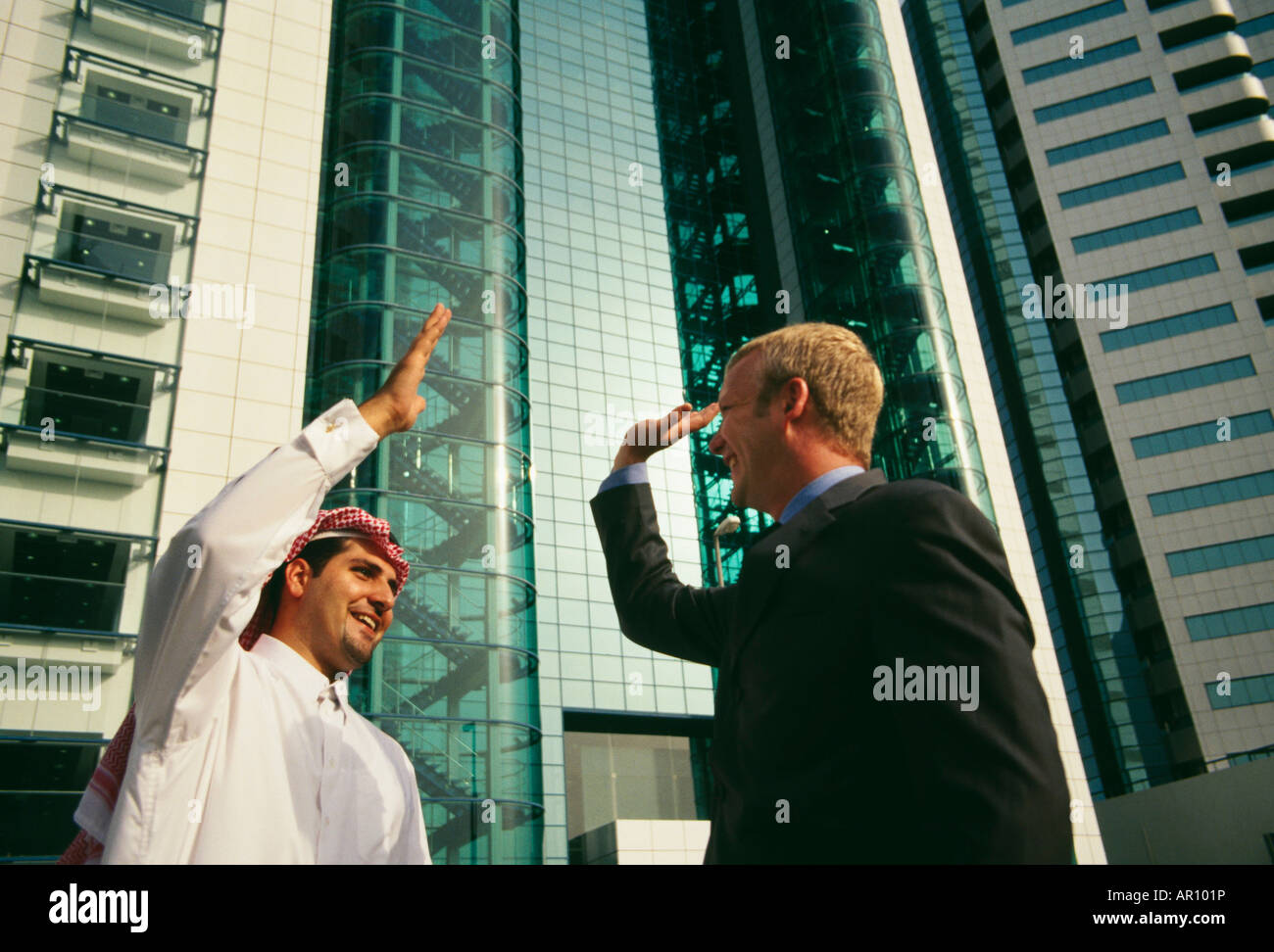 Two arab men greeting hi-res stock photography and images - Alamy