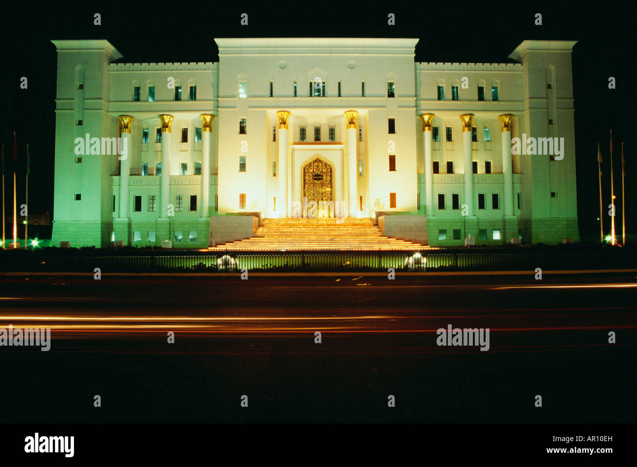 Front view of an illuminated building seen at night Stock Photo - Alamy