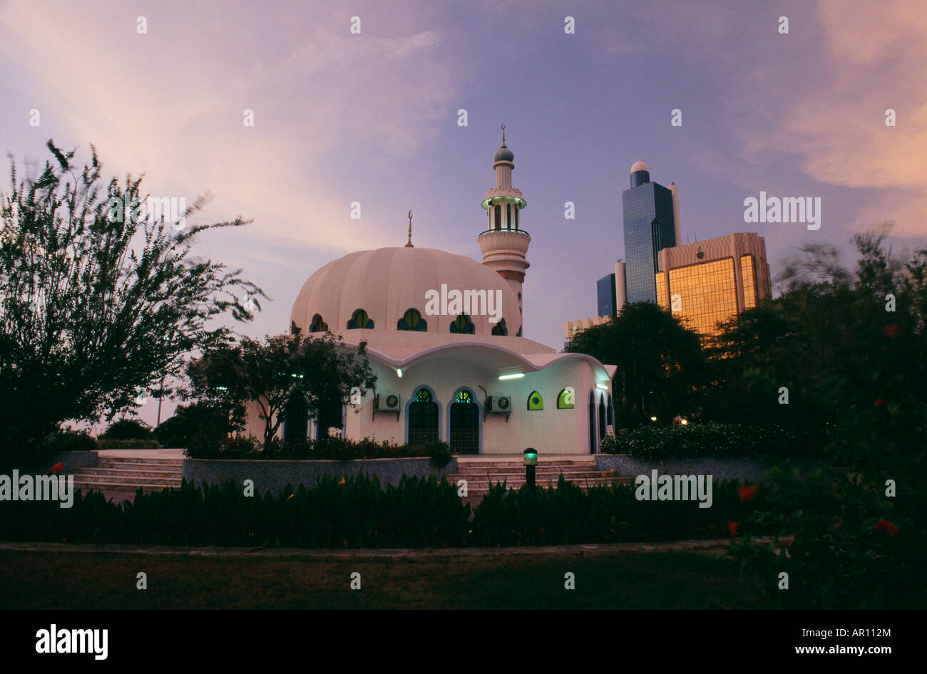 Side view of an elegant mosque surrounded with plants Stock Photo - Alamy
