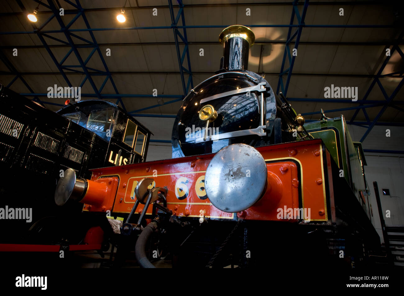 Front view of a steam train shot from a low angle with buffers in the ...