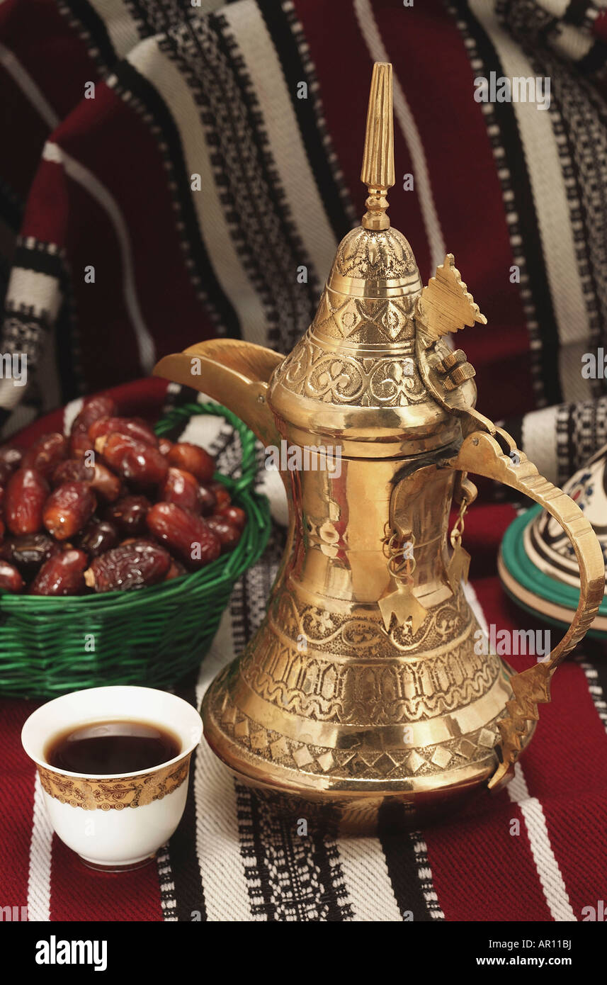 Arabic Coffee pot and cup with coffee Stock Photo - Alamy