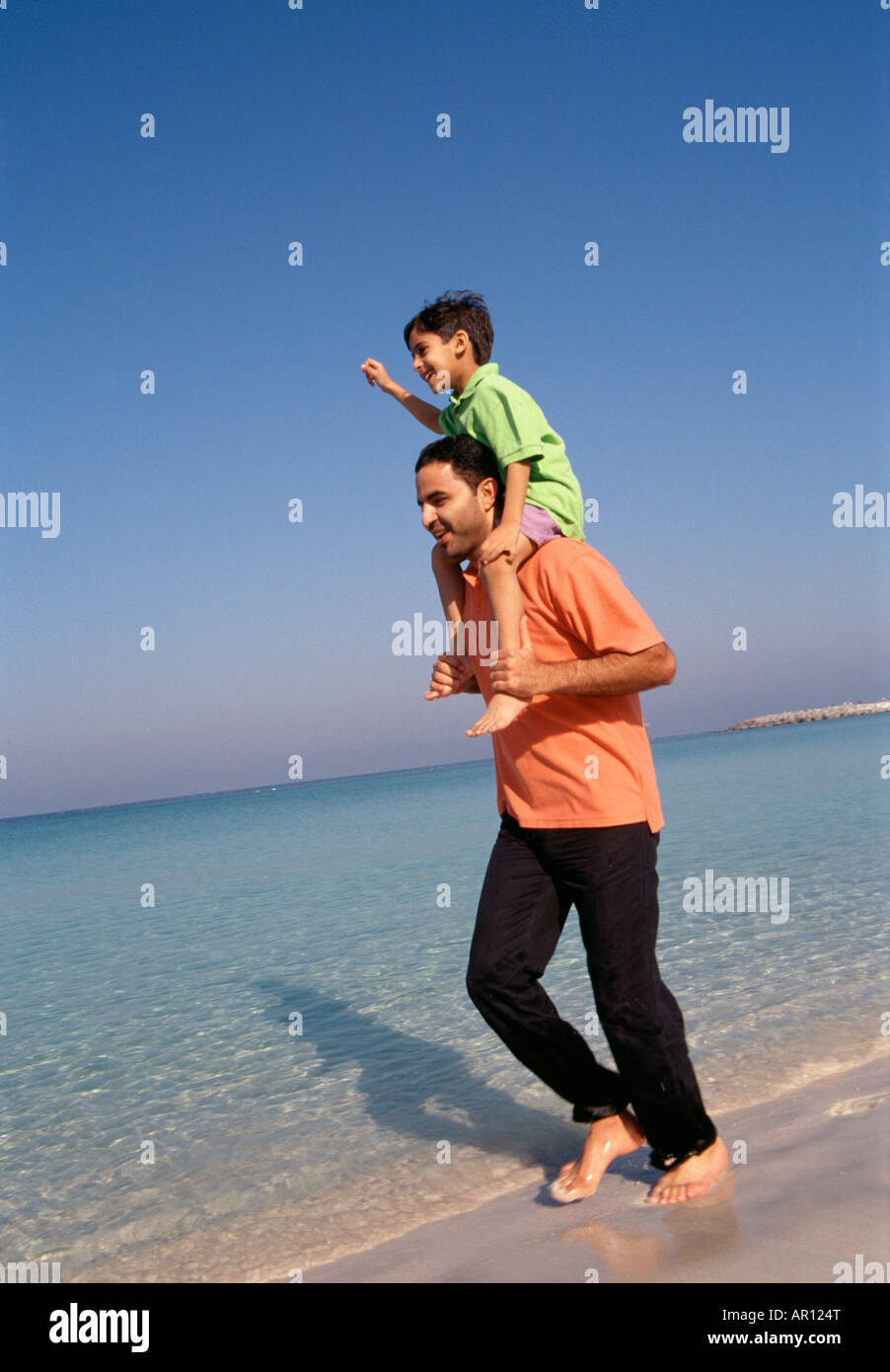 Father & son on the beach Stock Photo - Alamy