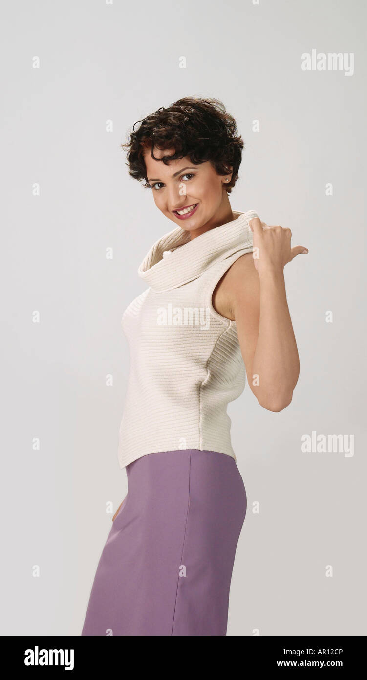 Lady Smiling with a Hand Gesture Stock Photo - Alamy