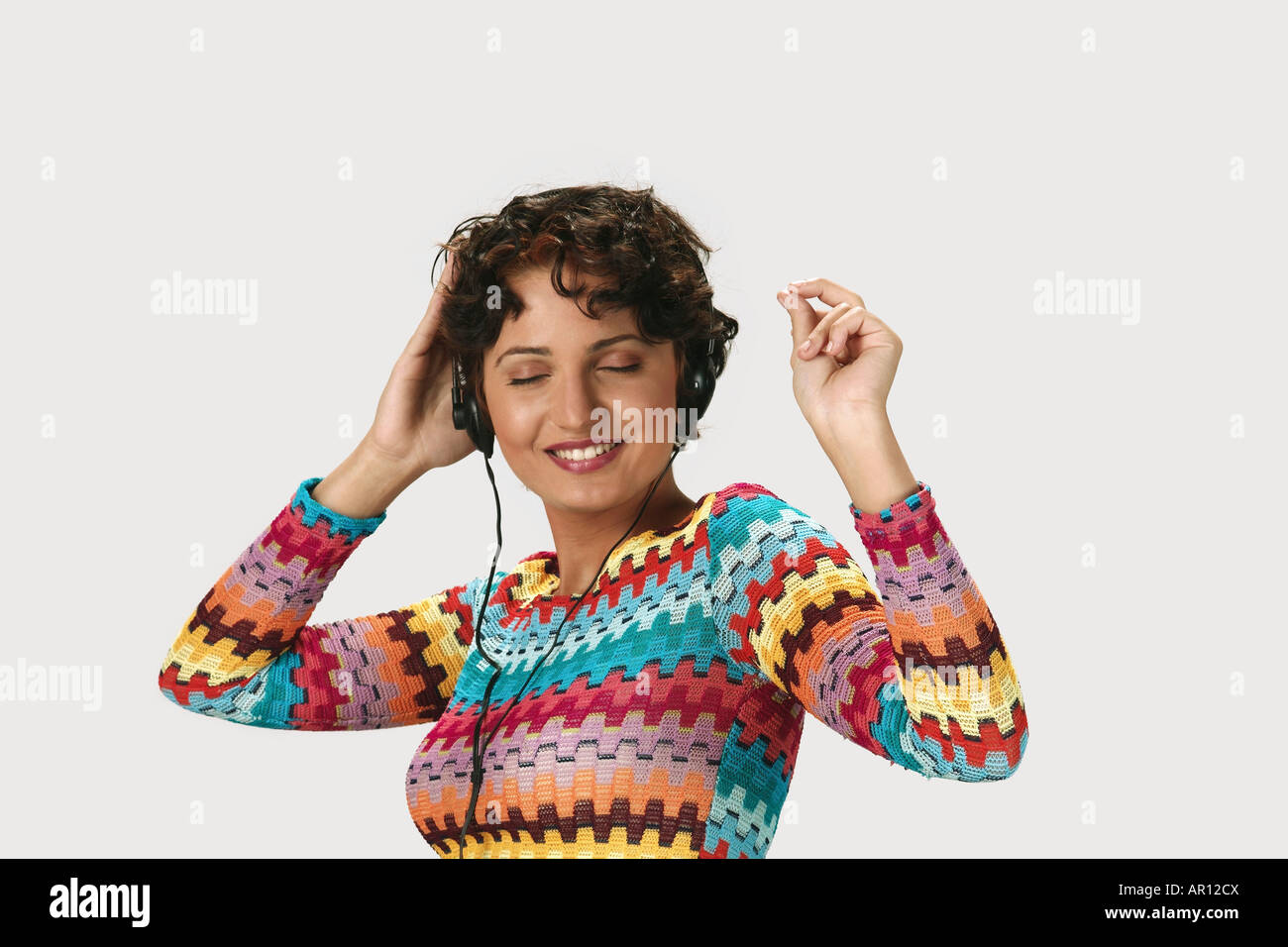 Lady listening a music Stock Photo - Alamy